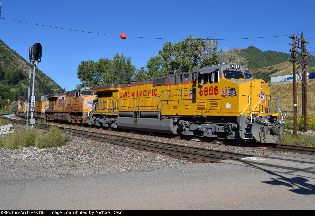 UP 6888 7612 6223 4846 5848 (C44ACM, C45ACCTE, C44ACM, SD70M, C44ACCTE) lead an eastbound stack ...